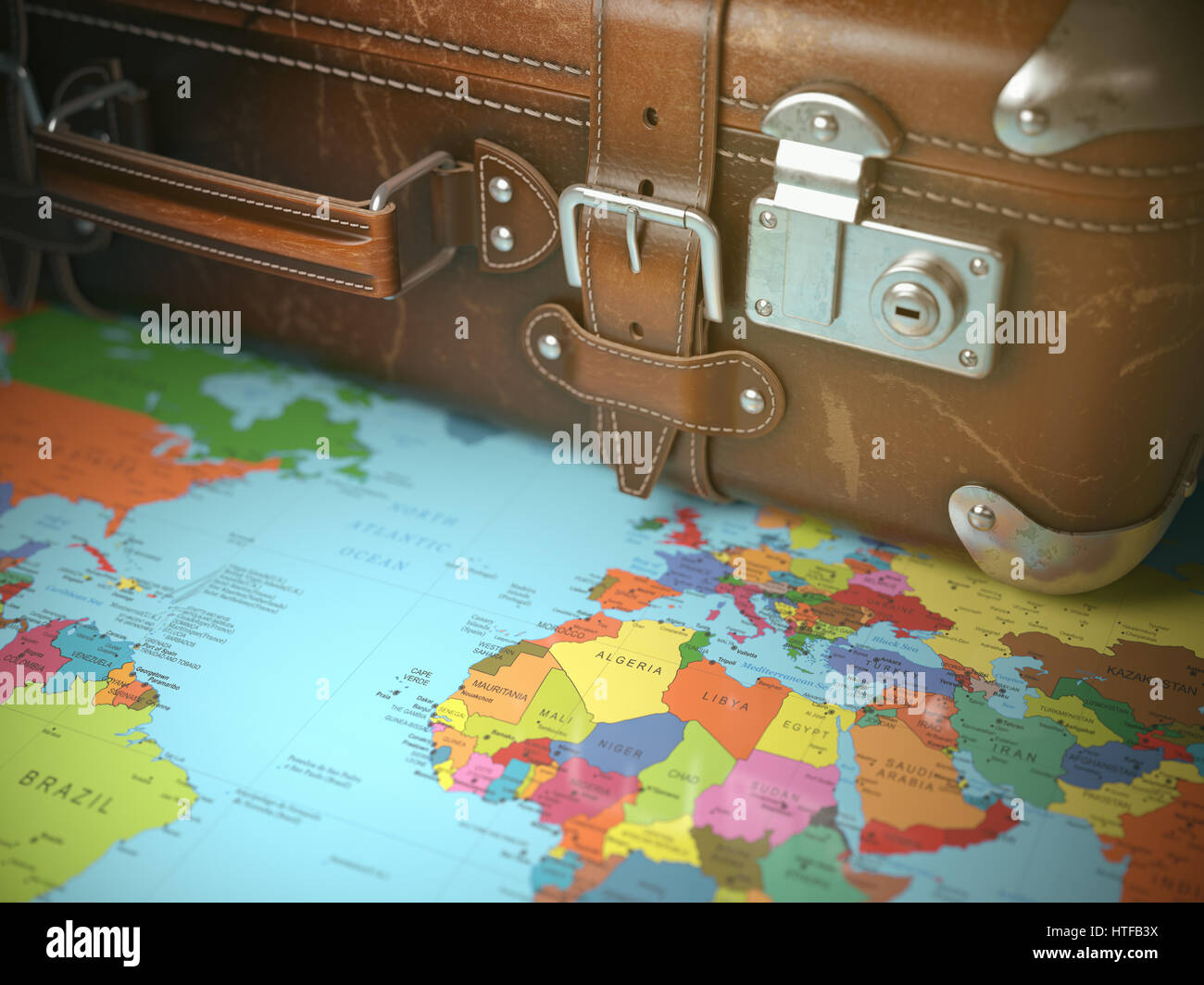 Travel and vacations background concept. Vintage suitcase on the world ...
