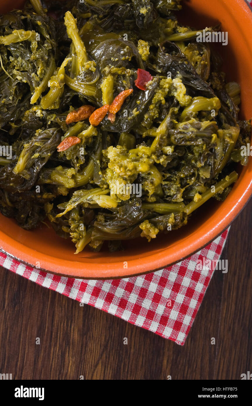 Stewed turnip greens. Cime di rapa stufate Stock Photo - Alamy