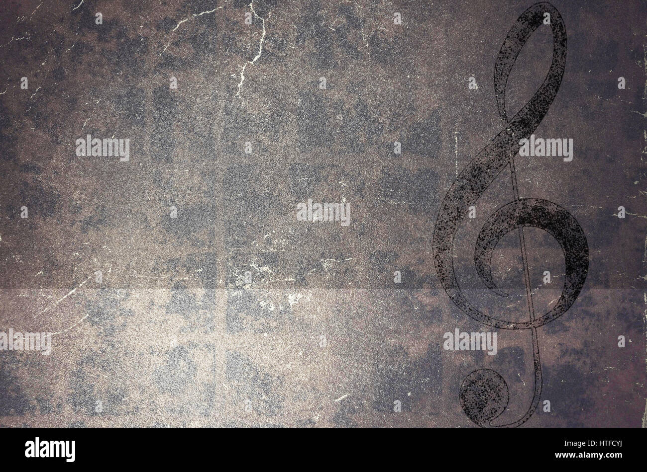 treble clef textured dark stone worktop detail - copy space Stock Photo ...