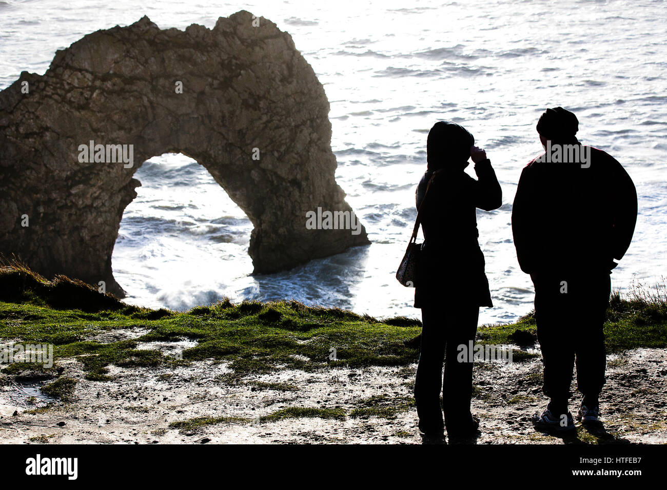 People standing on the Dorset Jurassic coast path at durdle door on a ...
