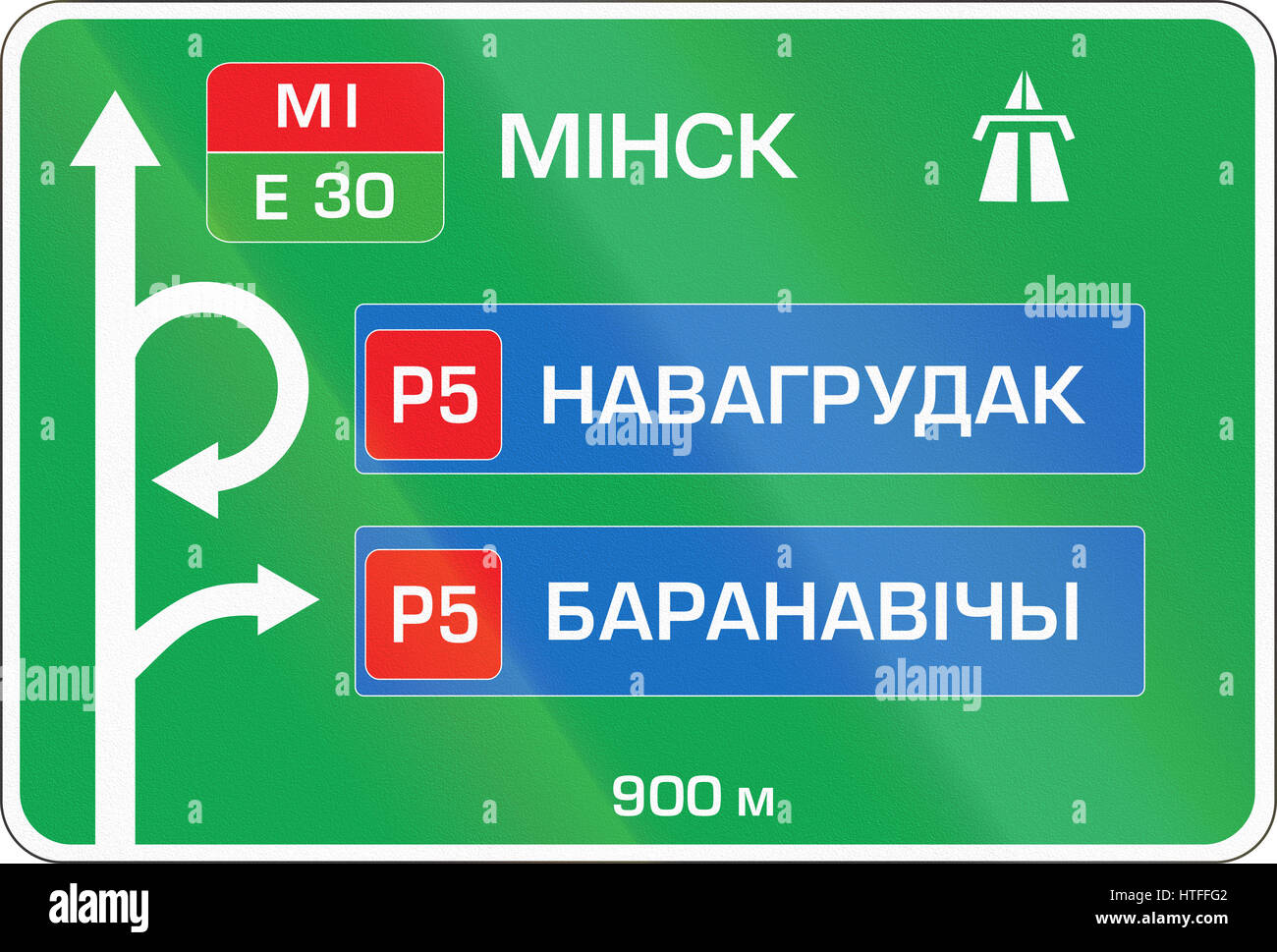 Belarusian direction road sign on a highway Stock Photo - Alamy