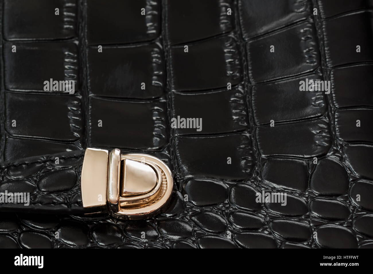 Gold and black handbag hi-res stock photography and images - Alamy