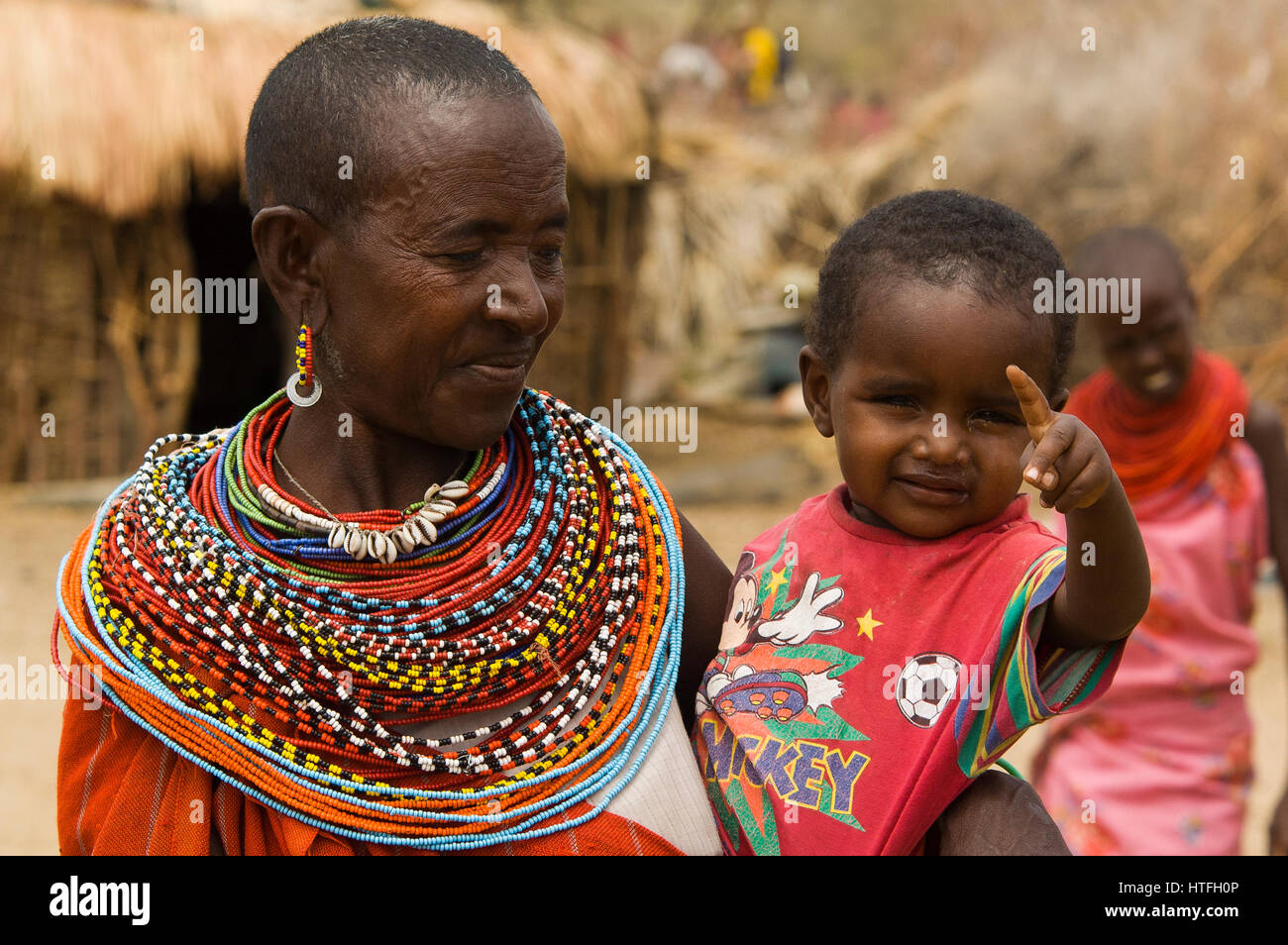 Samburu woman with kid at a manyatta near Archers Post, Samburu ...