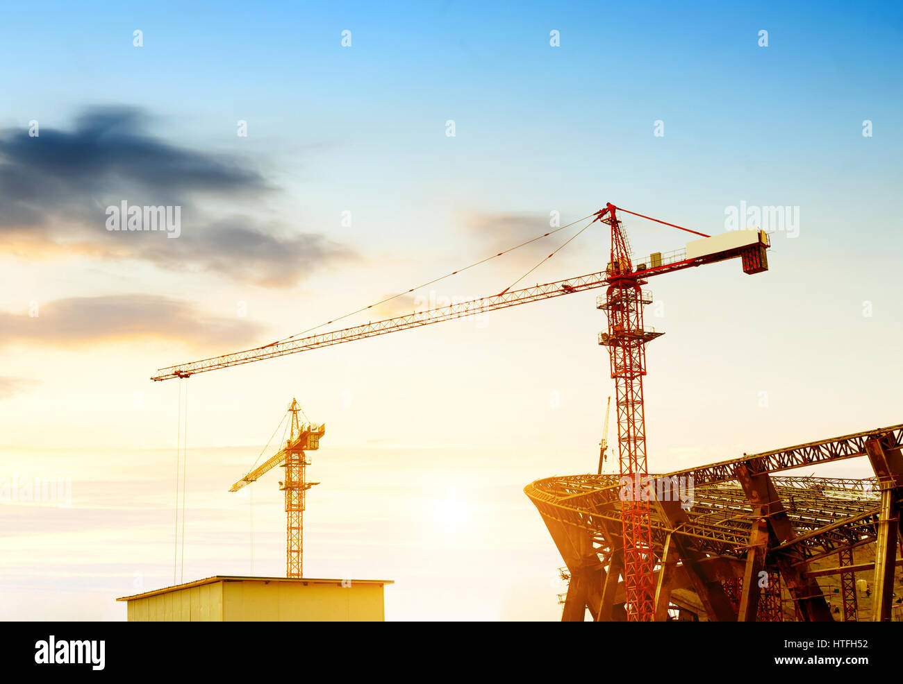Construction sites, cranes and huge steel structure Stock Photo - Alamy