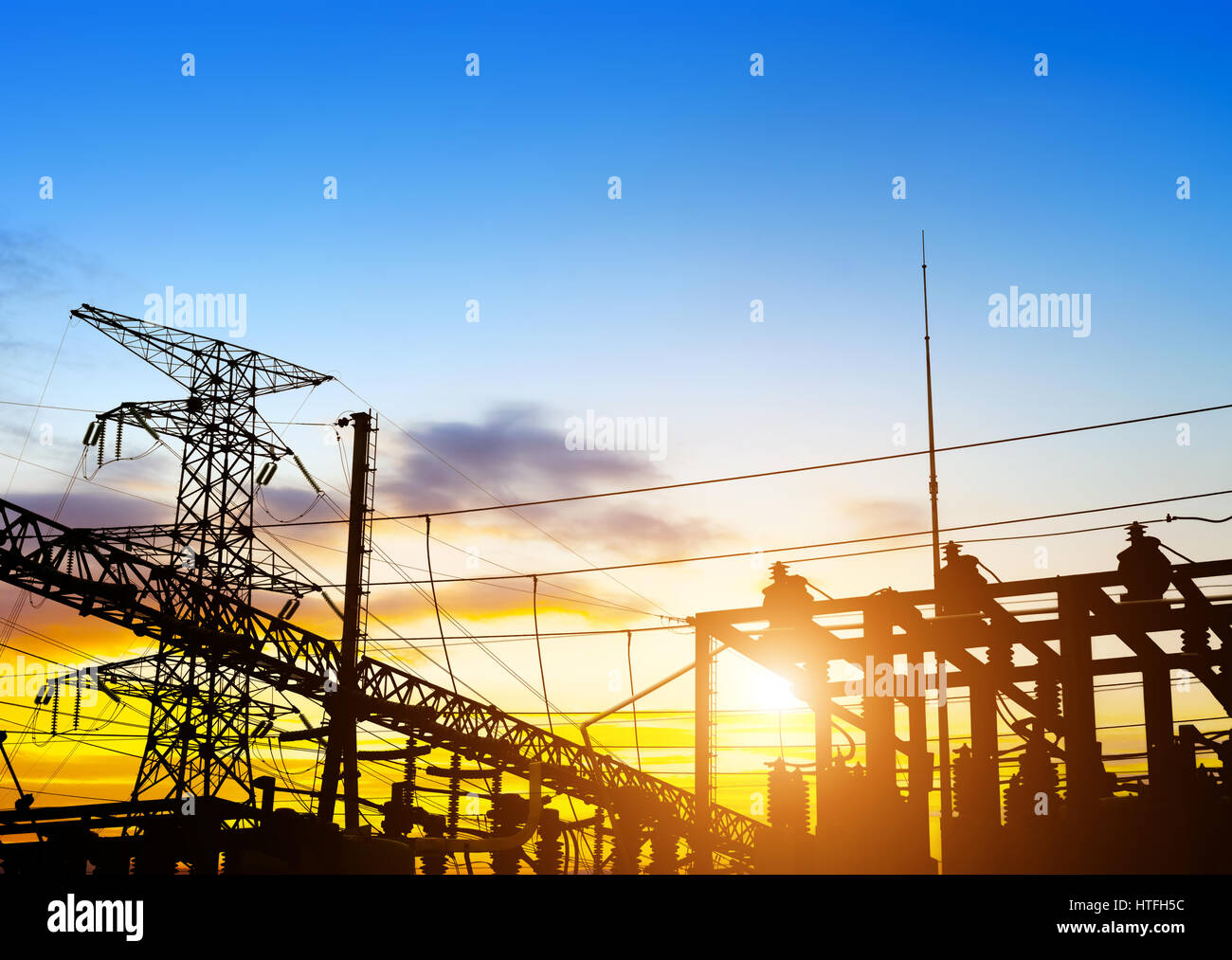distribution electric substation with power lines and transformers, at ...