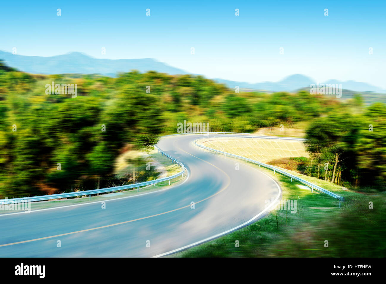 Curved highway, motion blur images Stock Photo - Alamy