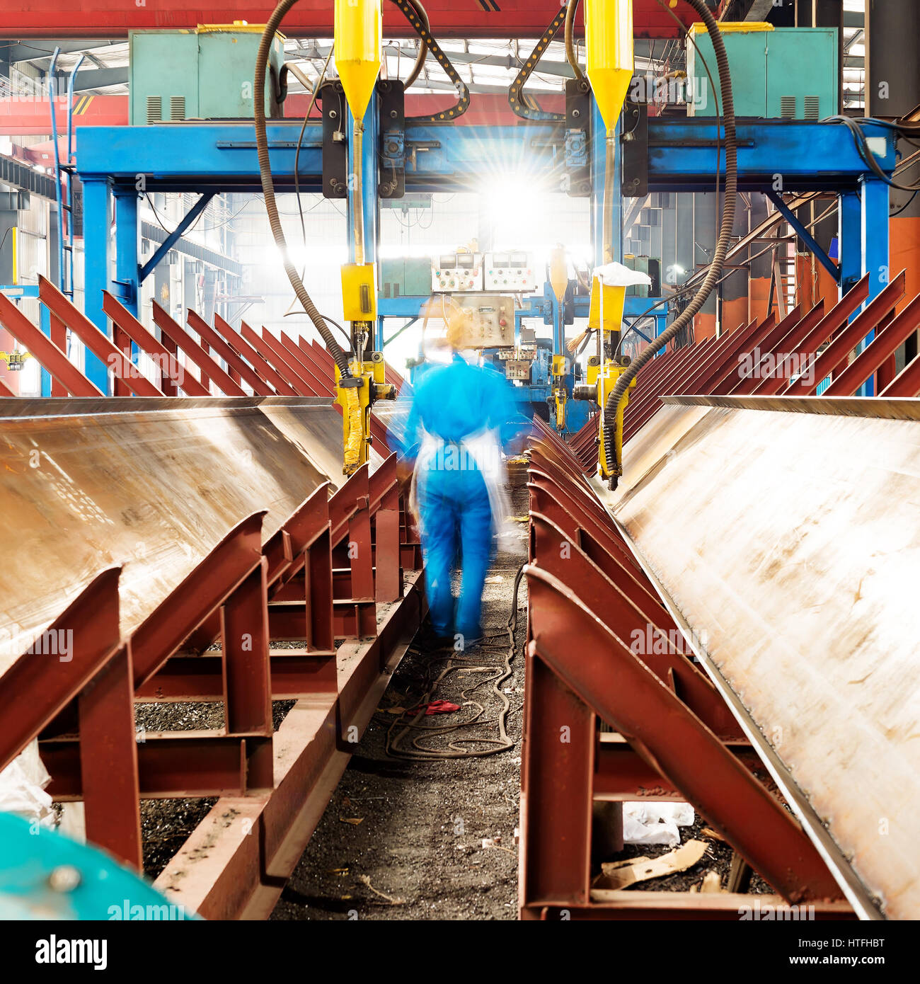 Workers in the steel processing plant Stock Photo - Alamy