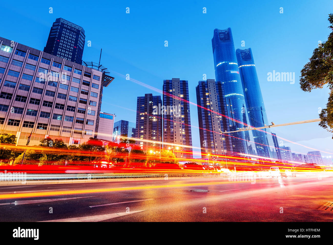 The light trails on the modern building background in shanghai china ...