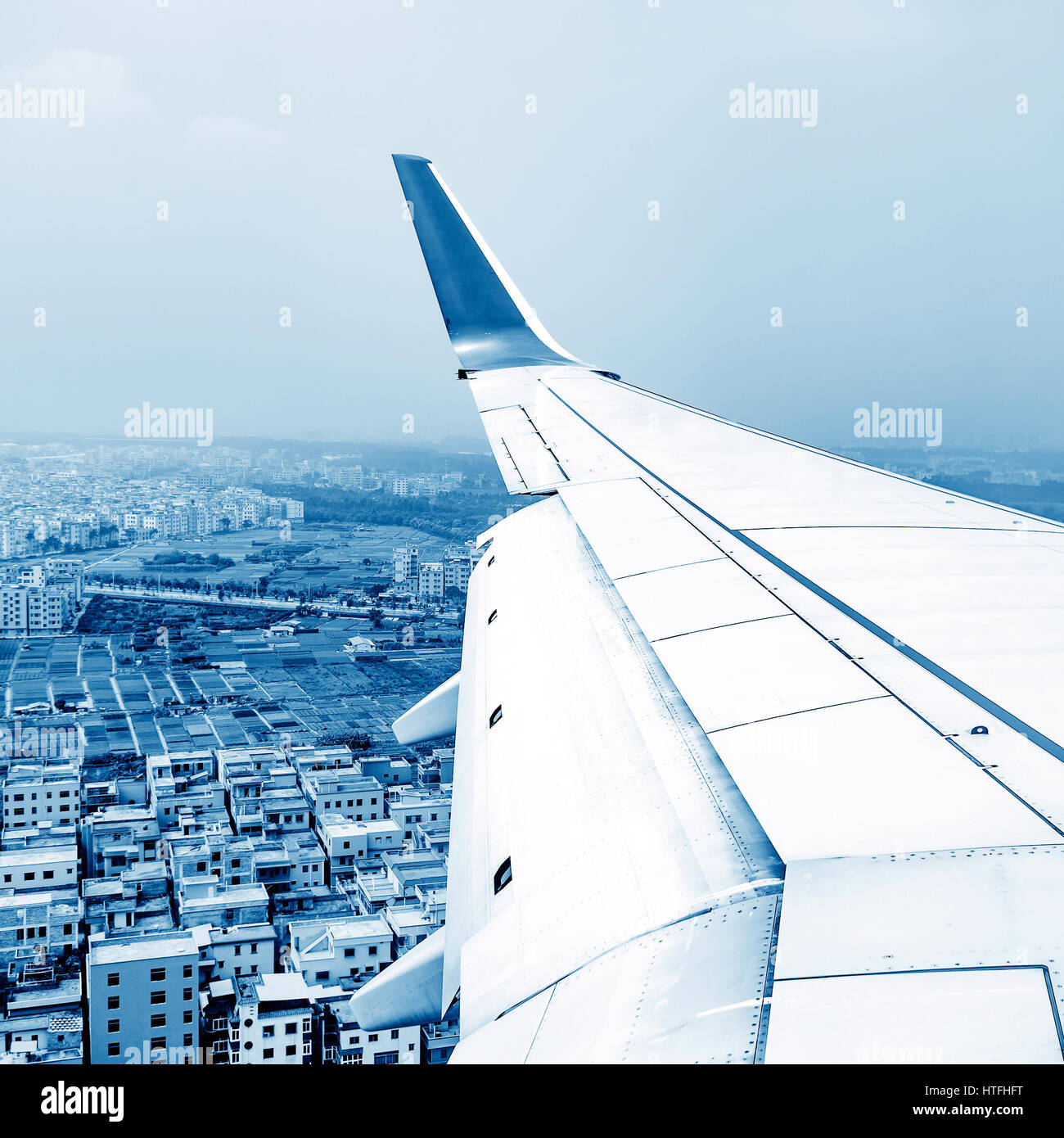 Low-flying aircraft in the Chinese countryside Stock Photo - Alamy
