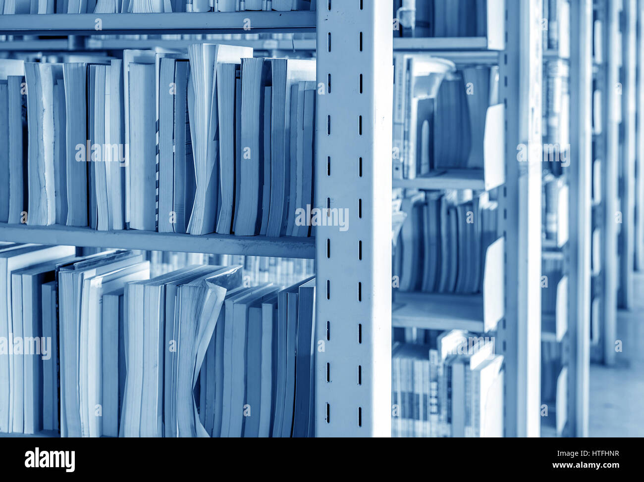 Blured books in public library. Blured effect. Background Stock Photo ...