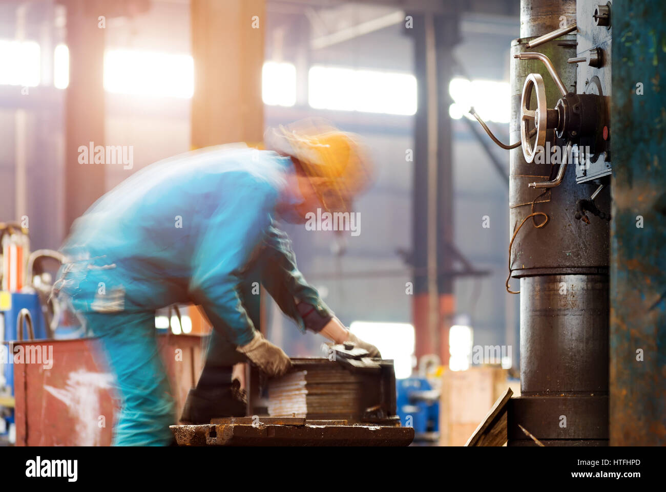 Workers serious work in front of radial drilling machine Stock Photo ...
