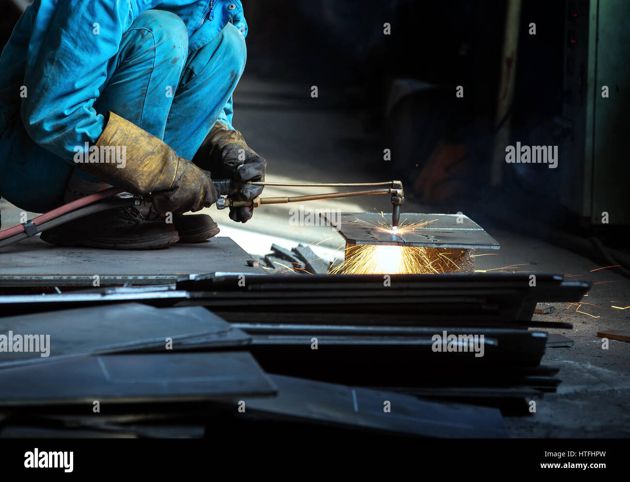 Workers at the construction site using a metal cutting torch Stock ...