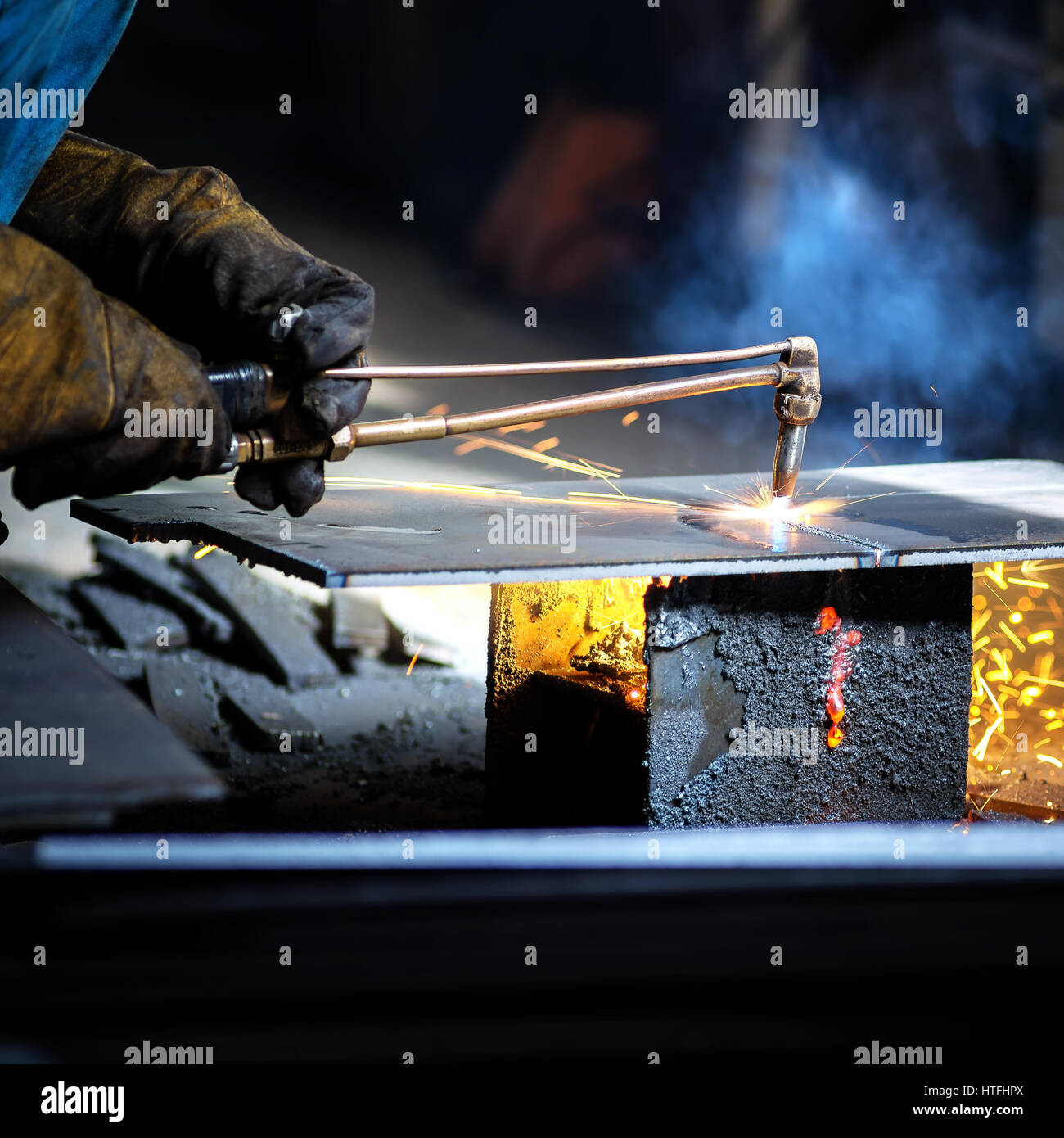 Workers at the construction site using a metal cutting torch Stock ...