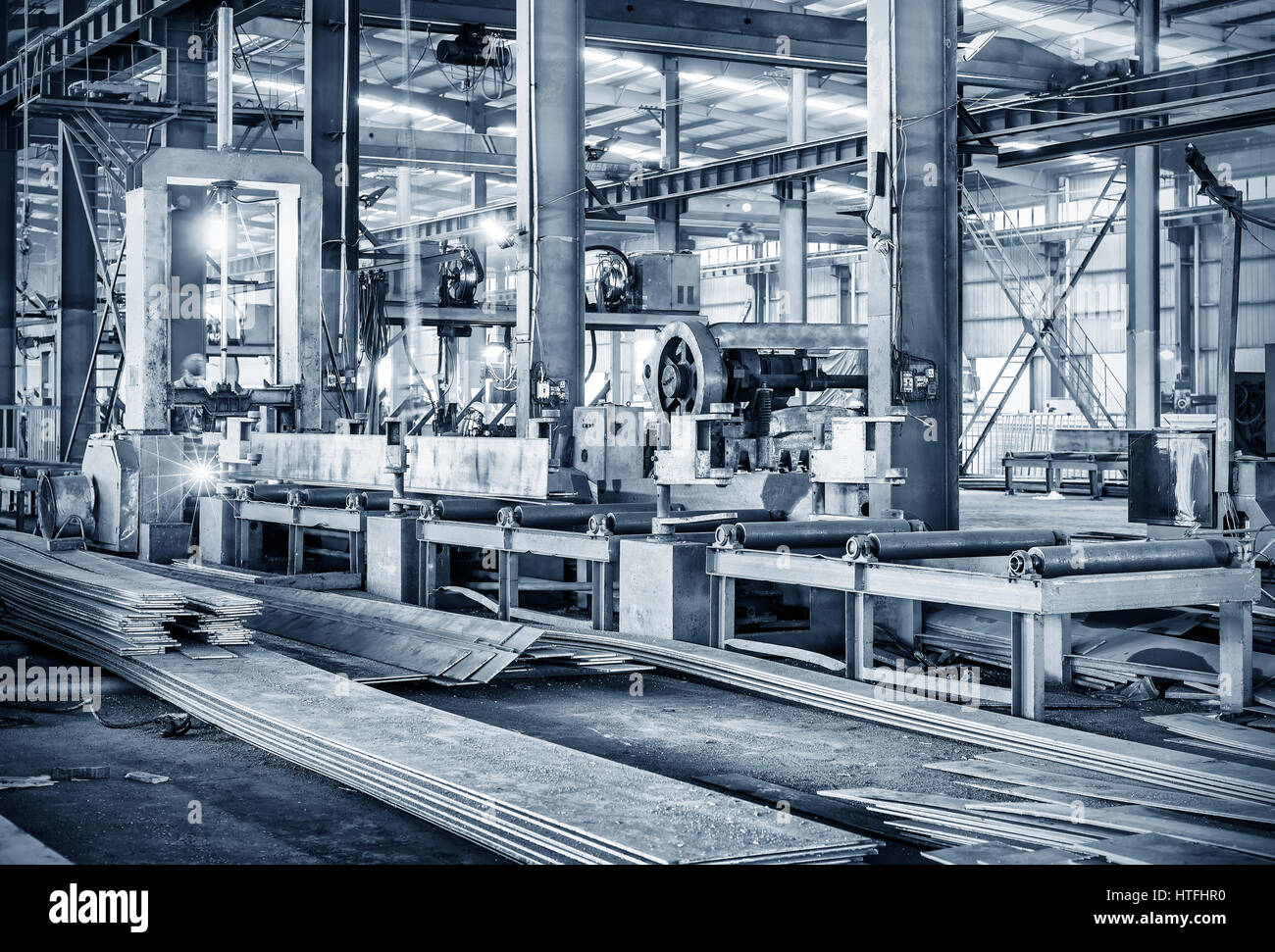 Steel factory production line, workers are working Stock Photo - Alamy