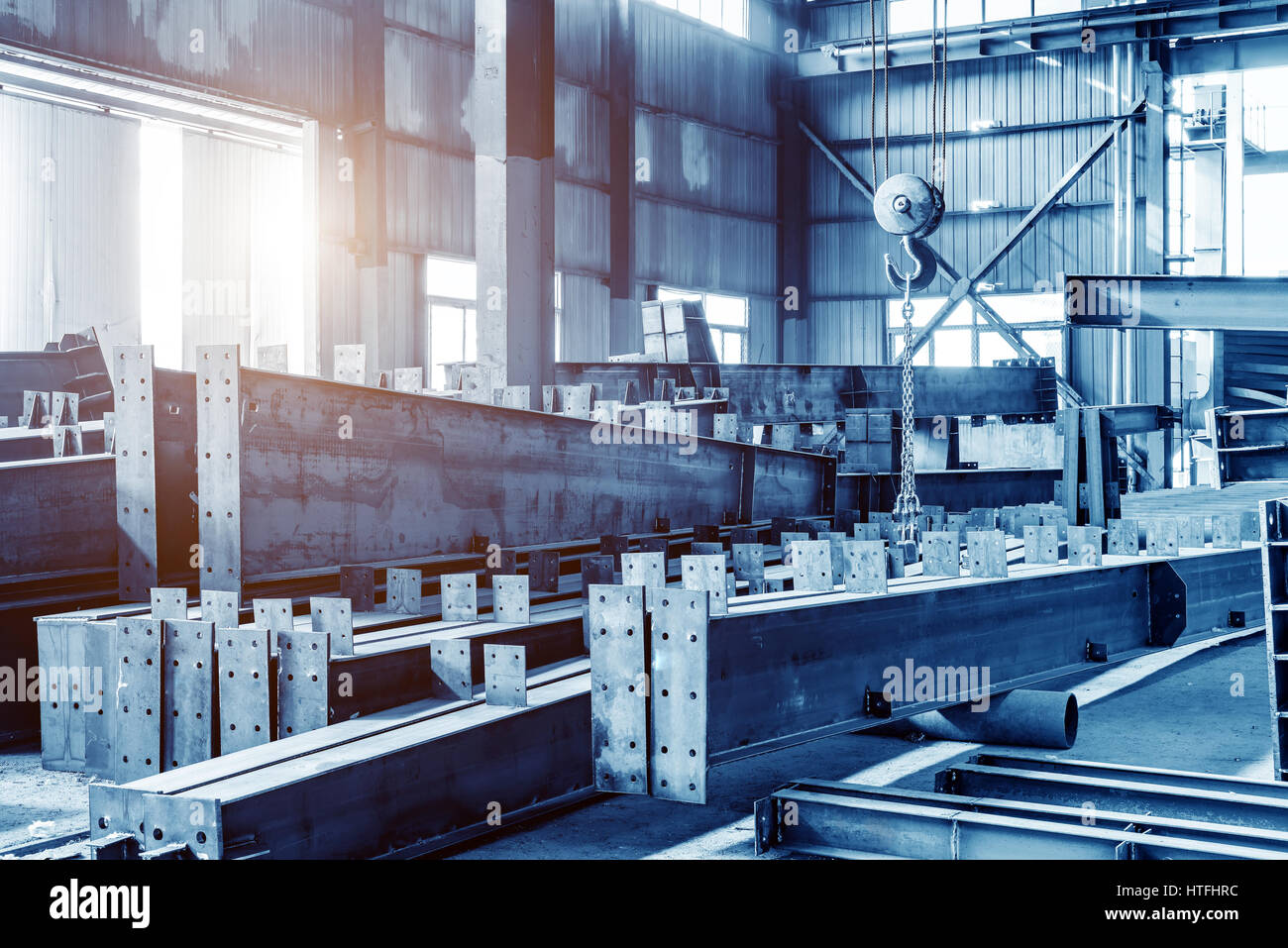 Steel factory floor, stacked with a lot of steel Stock Photo - Alamy