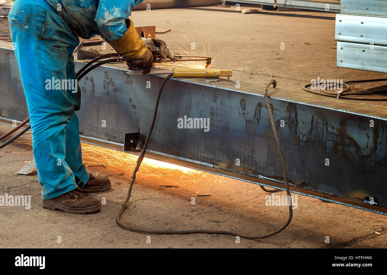 Workers at work, ongoing welding operation Stock Photo - Alamy