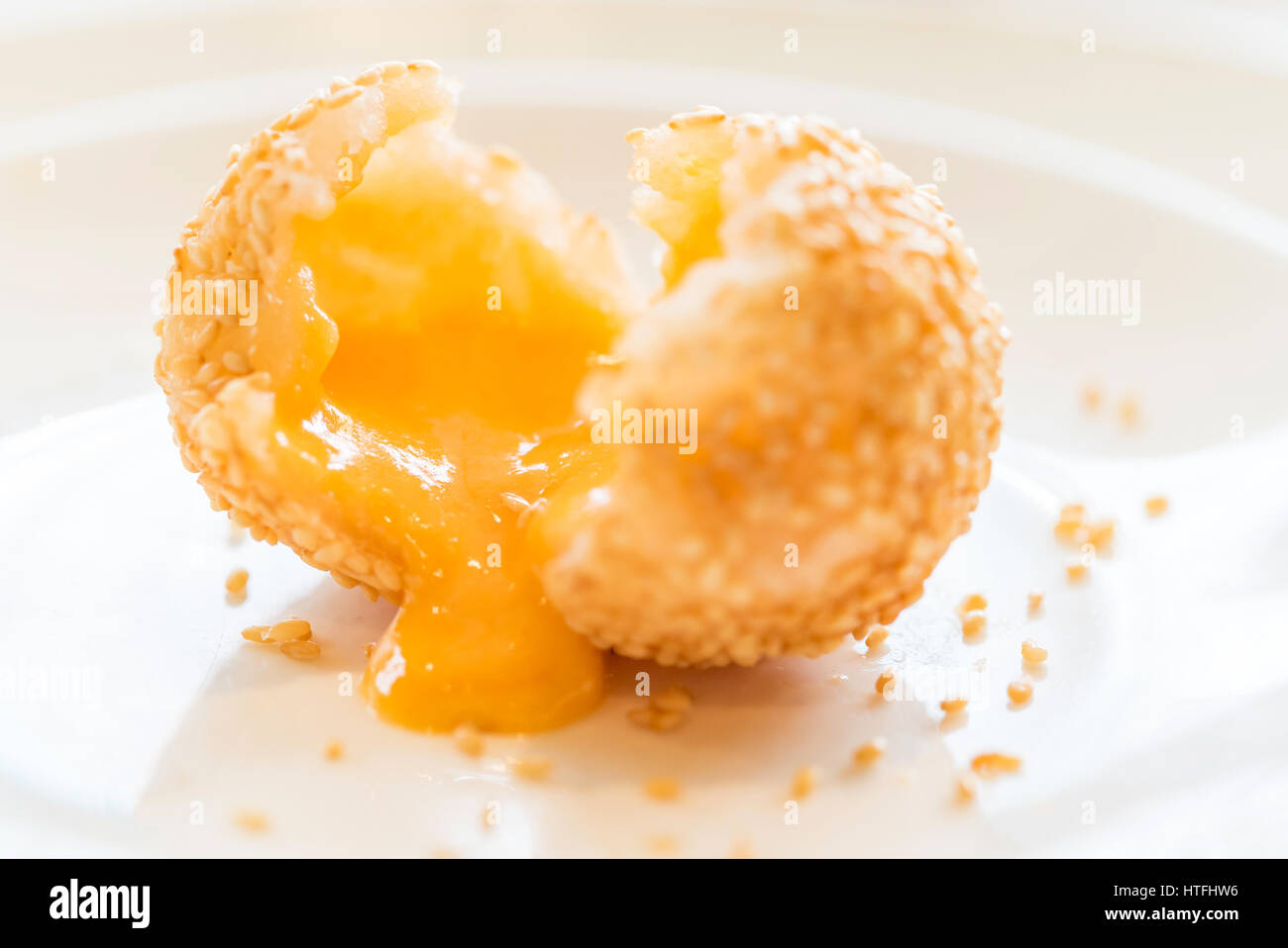 Chinese dim sum Fried sesame balls stuff with custard lava - Chinese ...