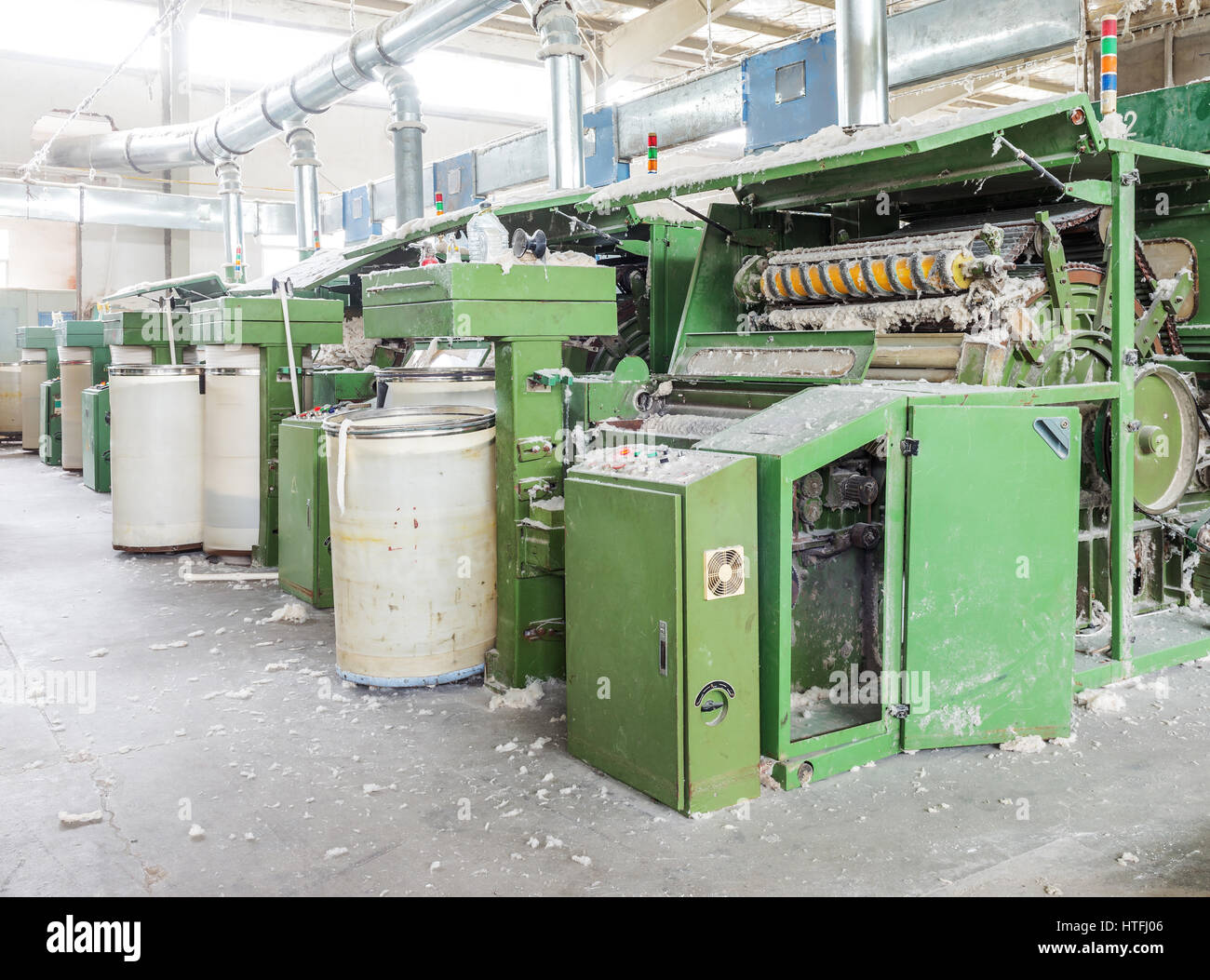 Closeup of machinery part at spinning factory Stock Photo - Alamy