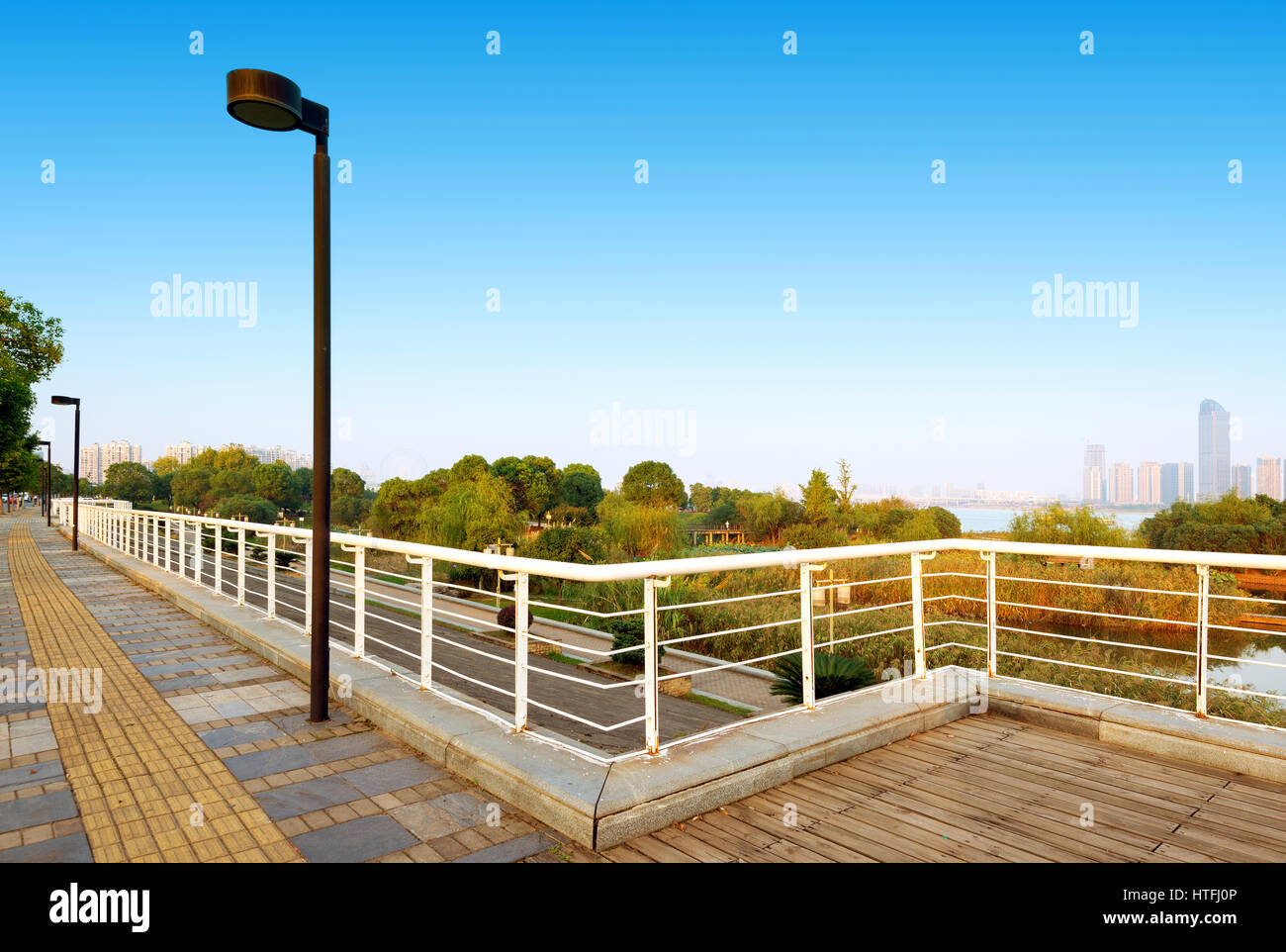 Street side of the fence, Chinese urban waterfront landscape Stock ...