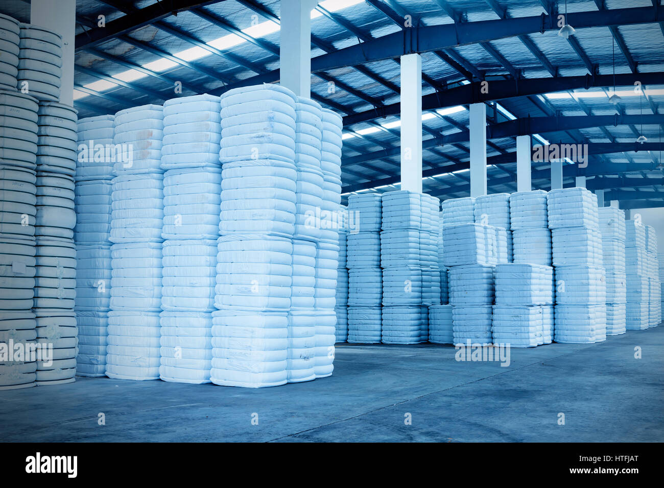 interior of a warehouse in a textile factory Stock Photo - Alamy