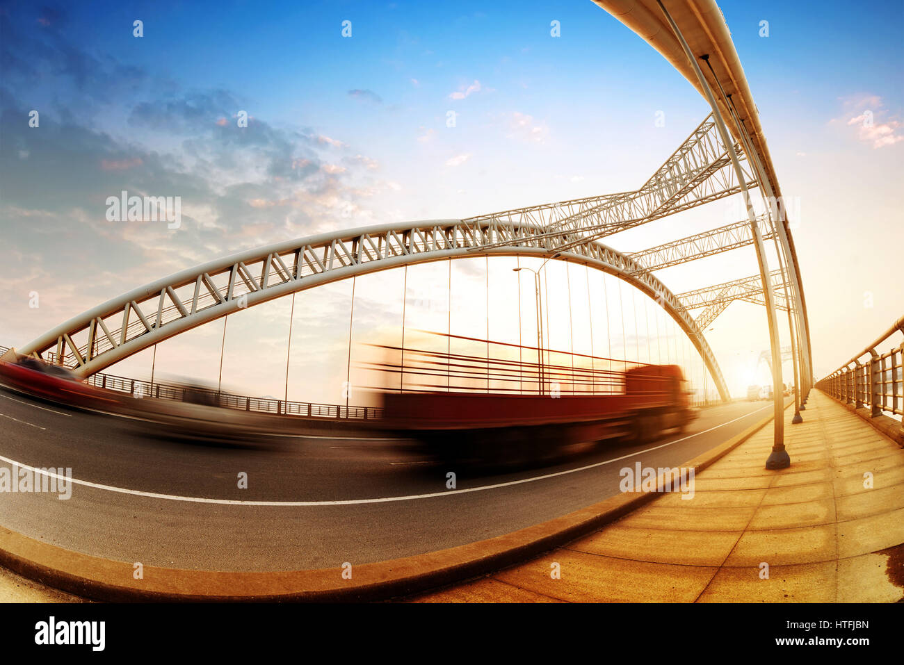 Bridges and high-speed driving truck Stock Photo - Alamy