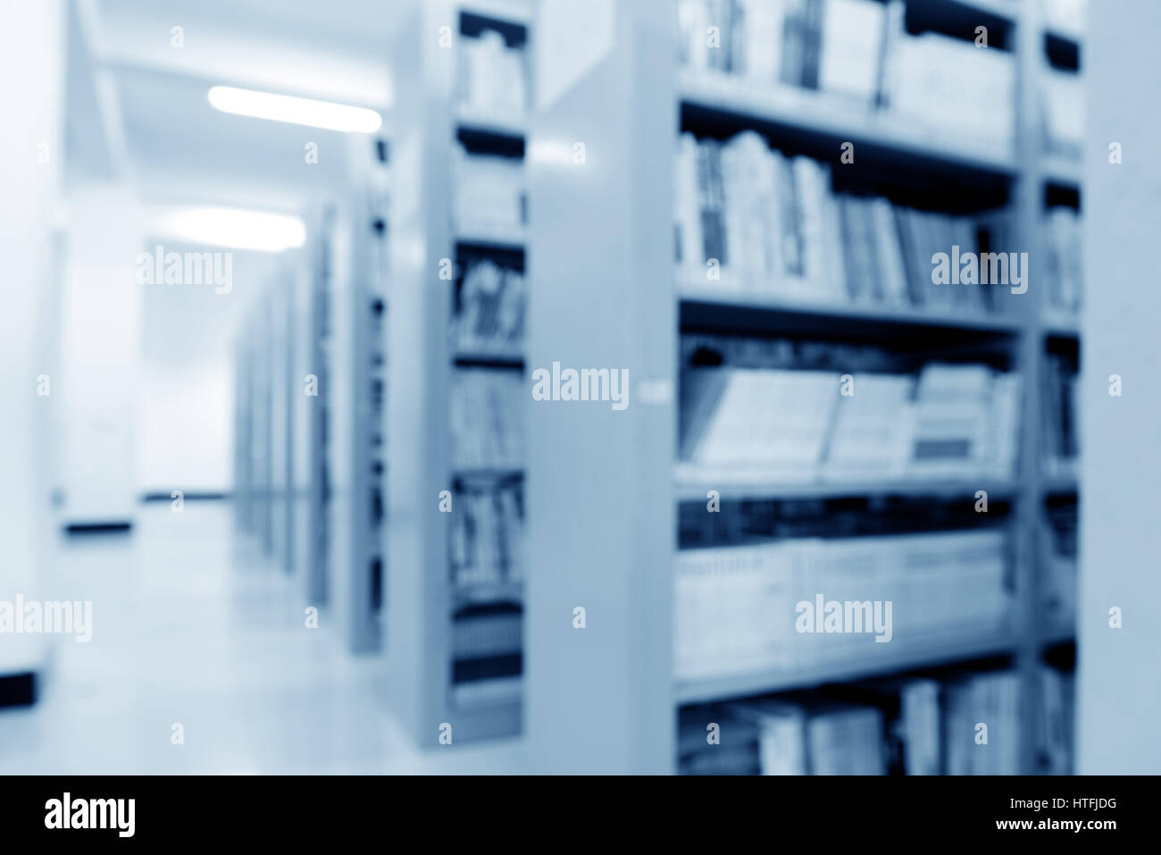 Blured books in public library. Blured effect. Background Stock Photo ...