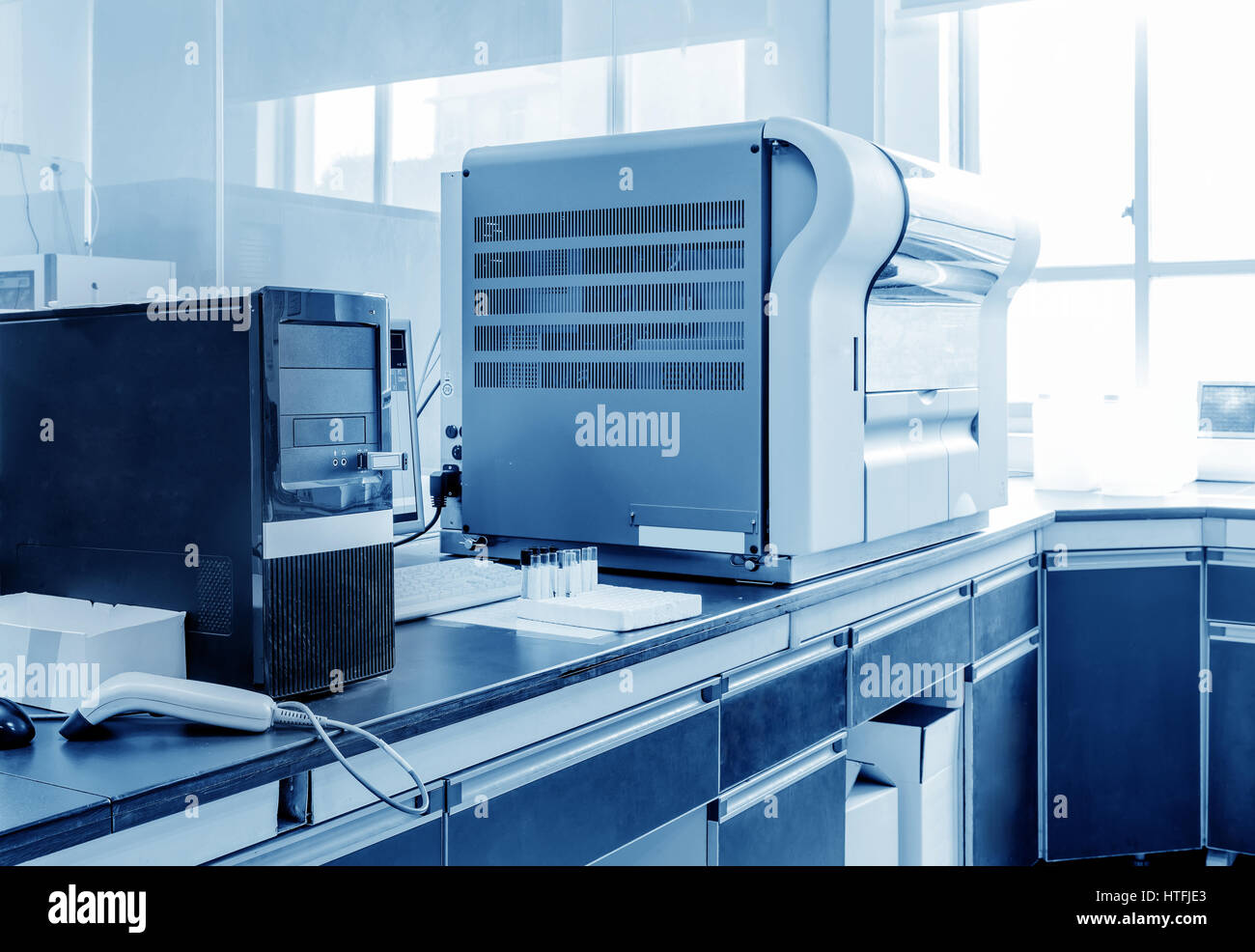 The laboratory coagulation analyzers and computers Stock Photo - Alamy