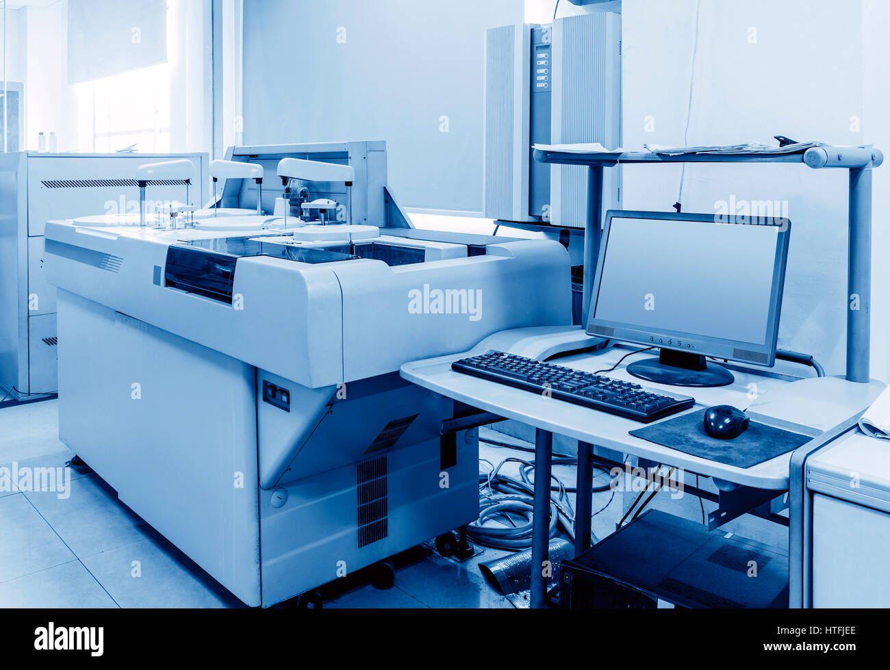 Hospital laboratories, automatic biochemical analyzer Stock Photo - Alamy