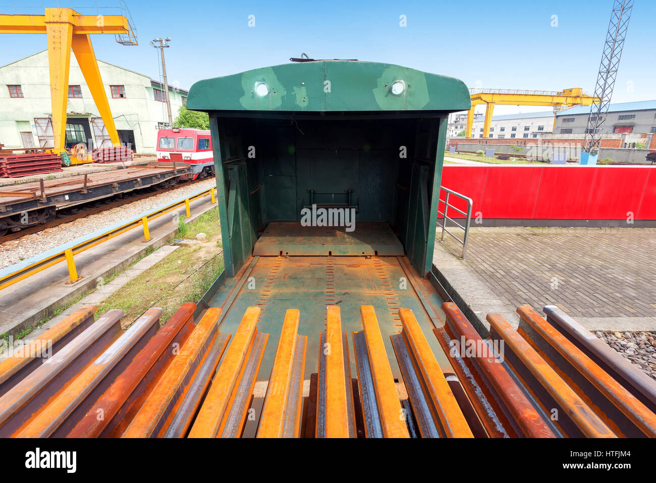 Pier bridge crane and cargo handling, cargo trains transported away ...