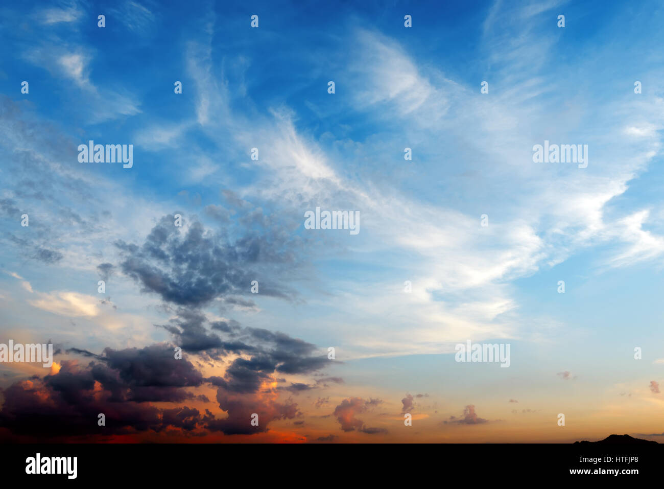 Sunset / sunrise with clouds, light rays and other atmospheric effect ...
