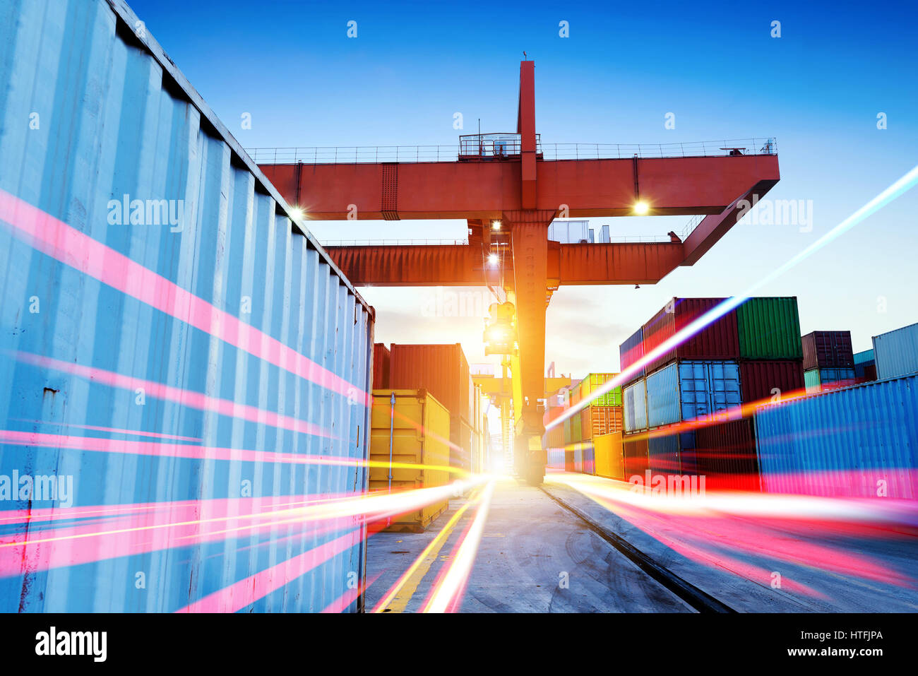 Container terminal at night, working in the bridge crane Stock Photo ...
