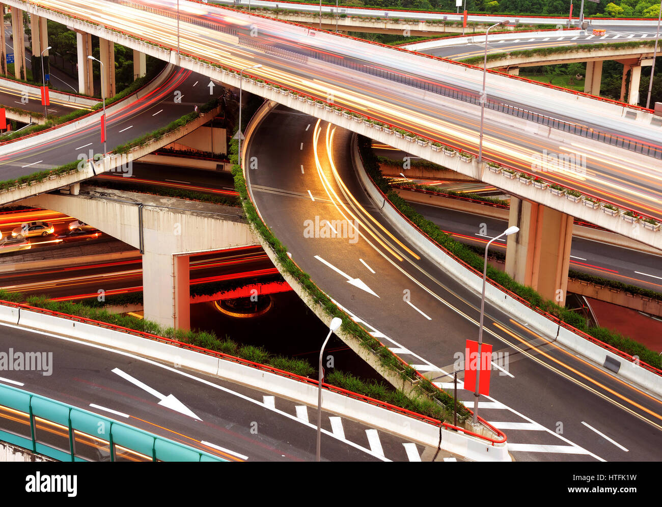 Freeway in night with cars light in modern city Stock Photo - Alamy