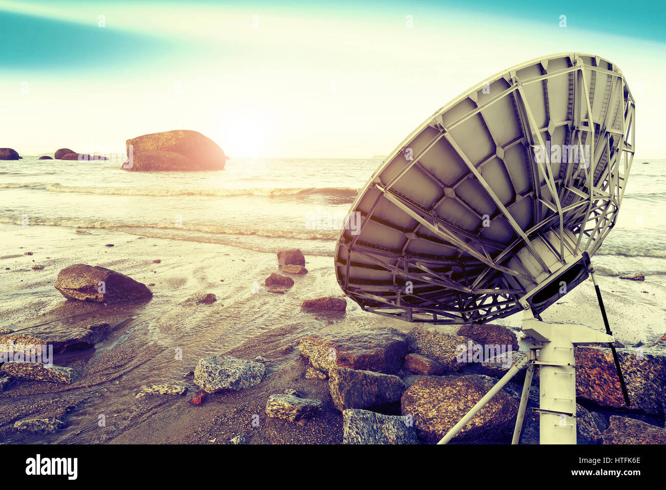 Satellite dishes at beautiful sunrise background Stock Photo - Alamy