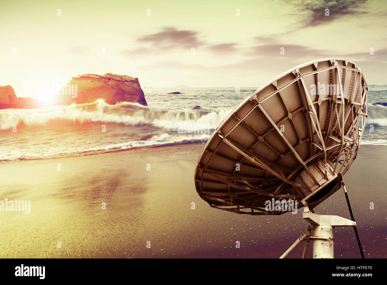 Satellite dishes at beautiful sunrise background Stock Photo - Alamy