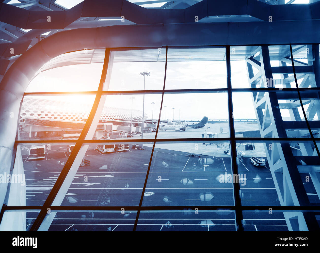 A passenger plane being serviced by ground services before next takeoff ...
