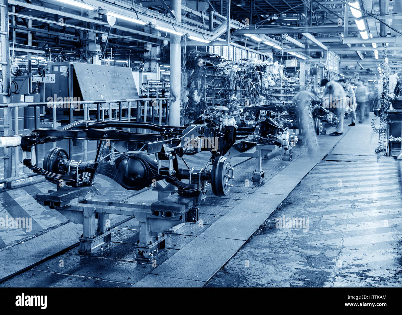 Factory floor, car production line, motion blur picture Stock Photo - Alamy