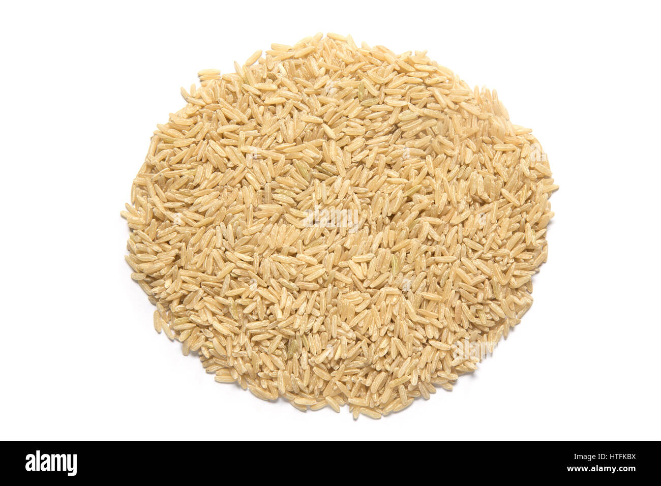 Uncooked Brown rice isolated on white background Stock Photo - Alamy