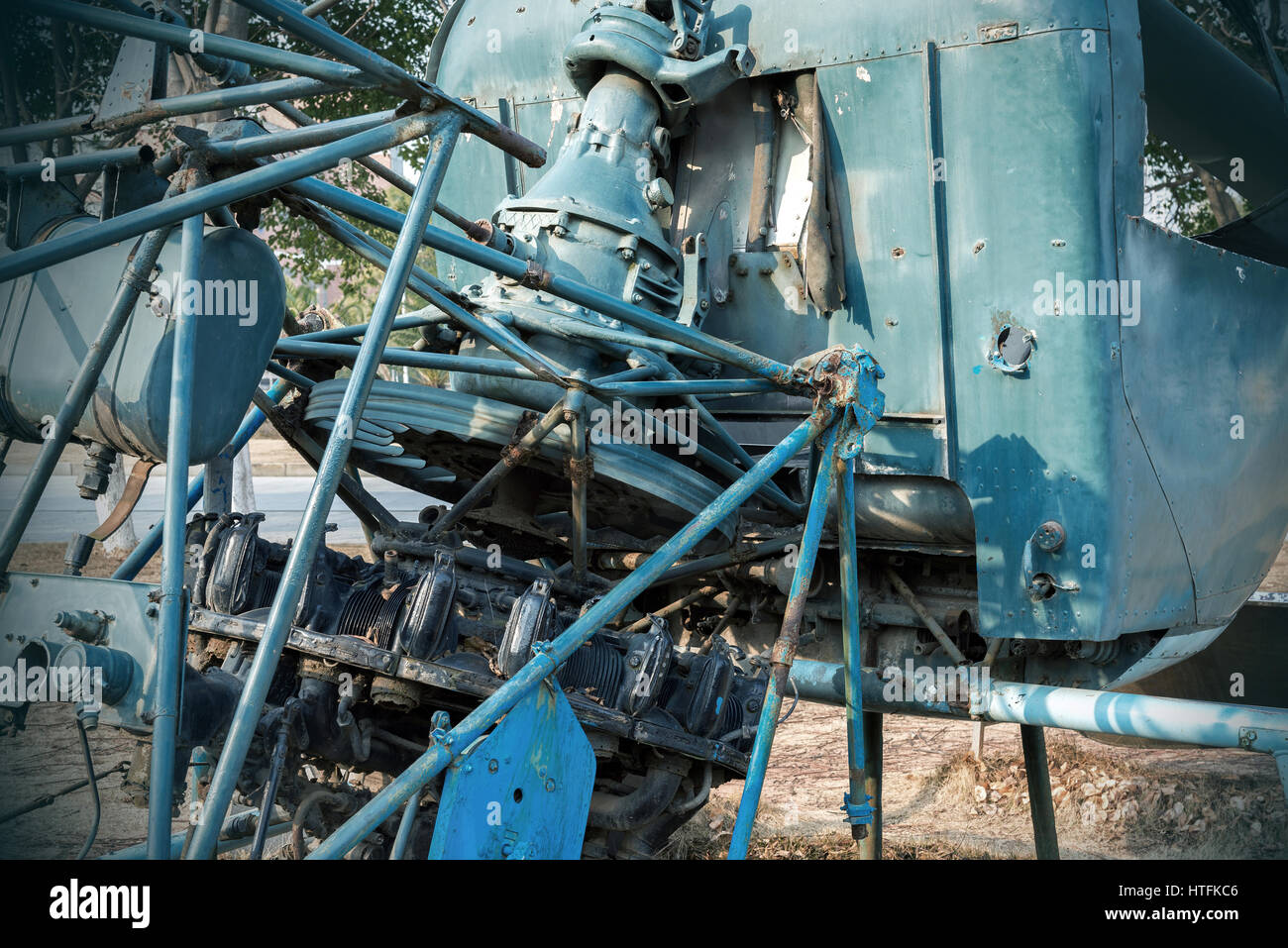 Scrapped helicopter, abandoned beside the road Stock Photo - Alamy