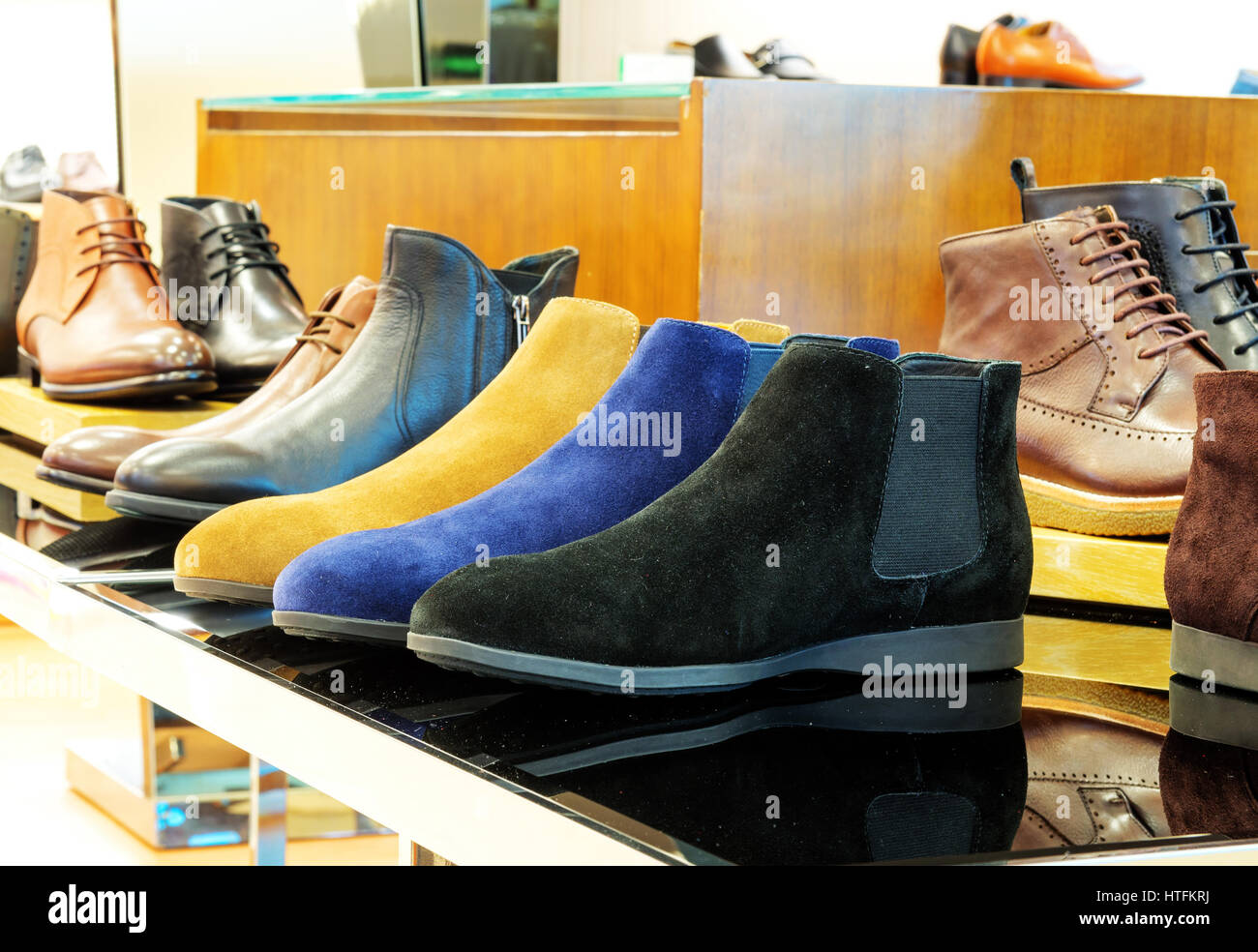 bright and fashionable interior of shoe store in modern mall Stock ...