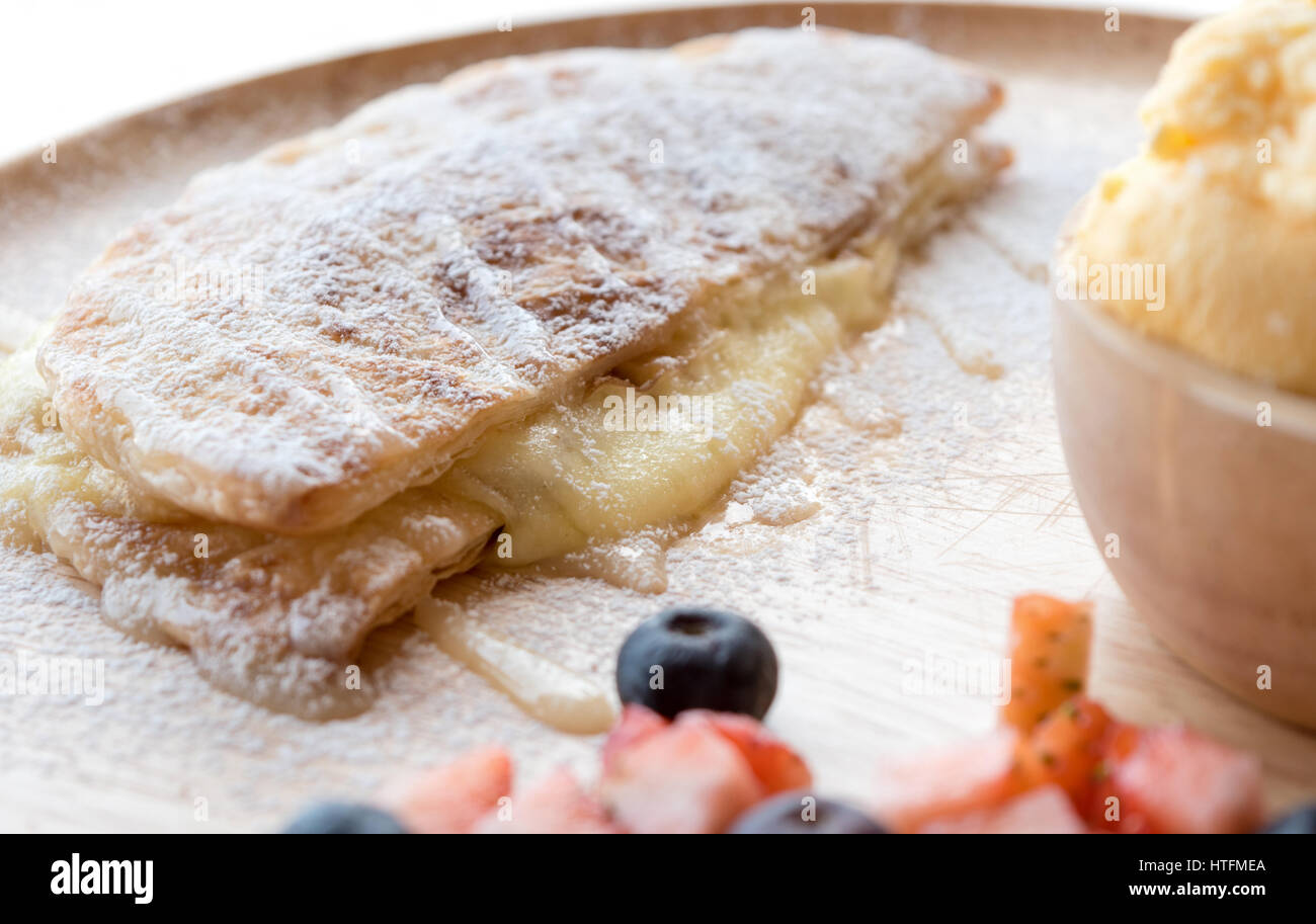 fresh dessert soft vanila roti with ice cream ,syrup ,strawberry and ...