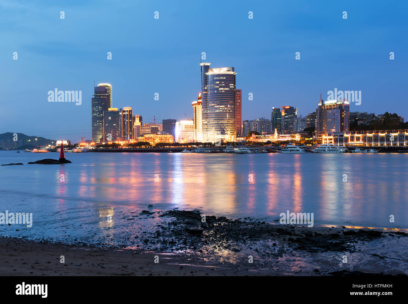 China Xiamen city night, seaside skyscrapers Stock Photo - Alamy