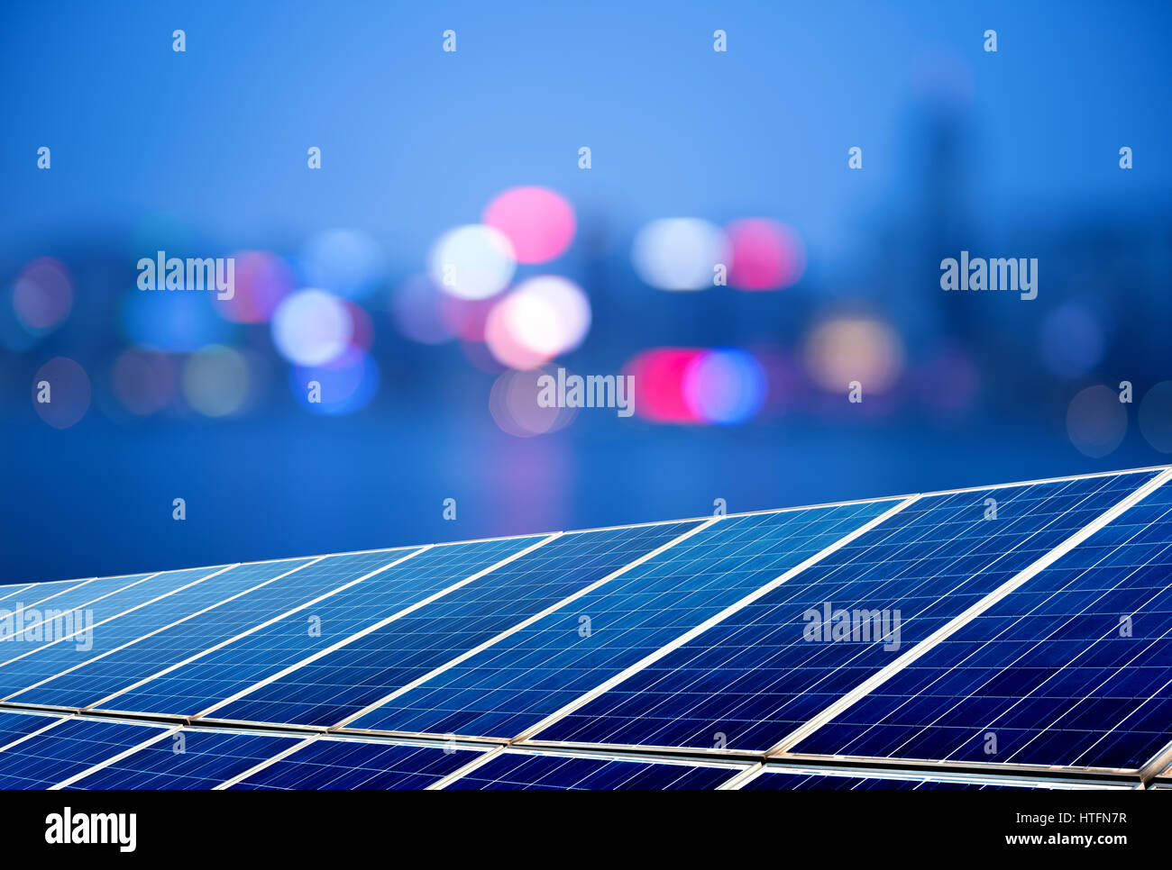 Urban landscape as the background of the solar panel Stock Photo - Alamy