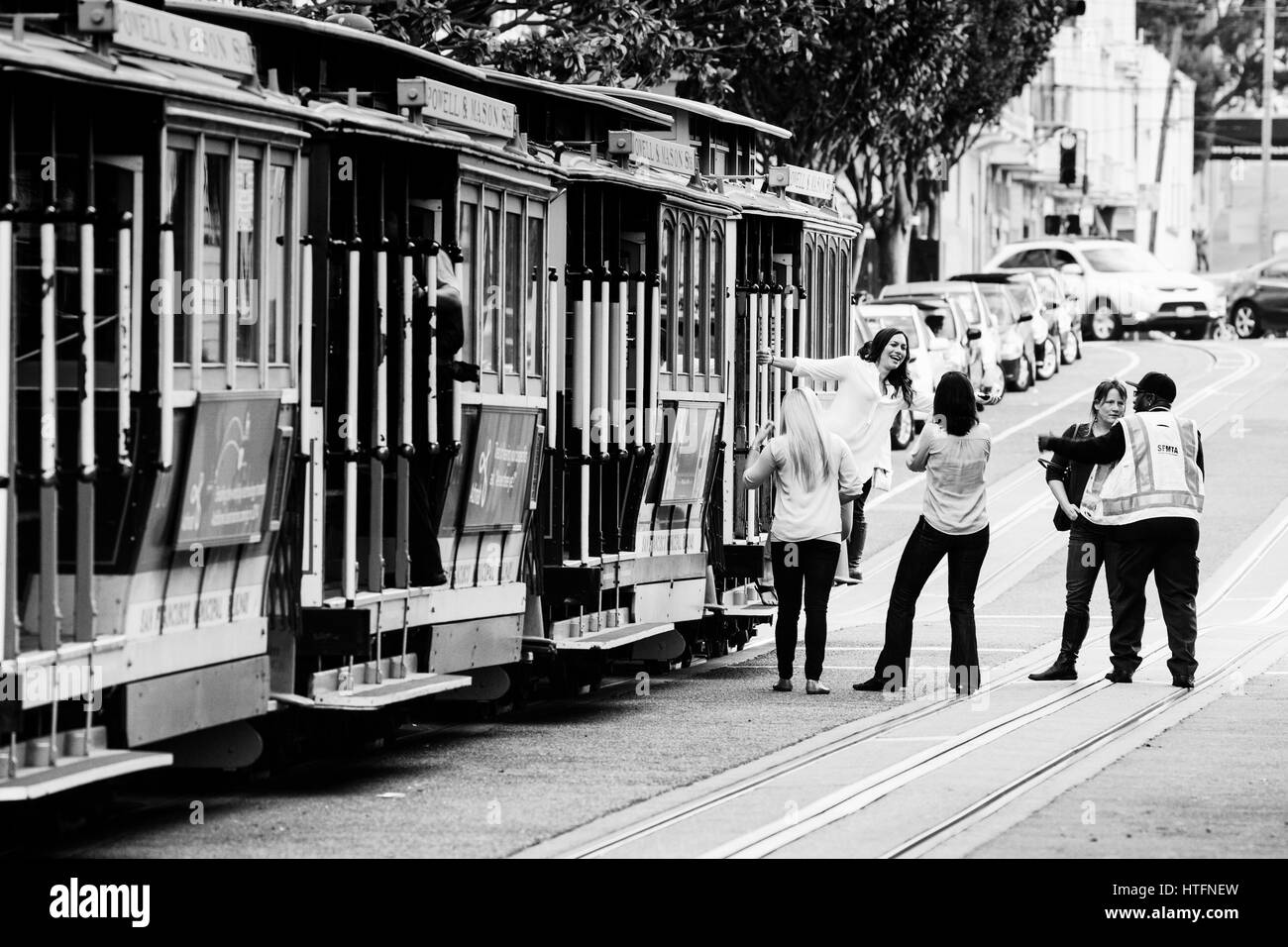 People posing on San Francisco cable cars Stock Photo - Alamy