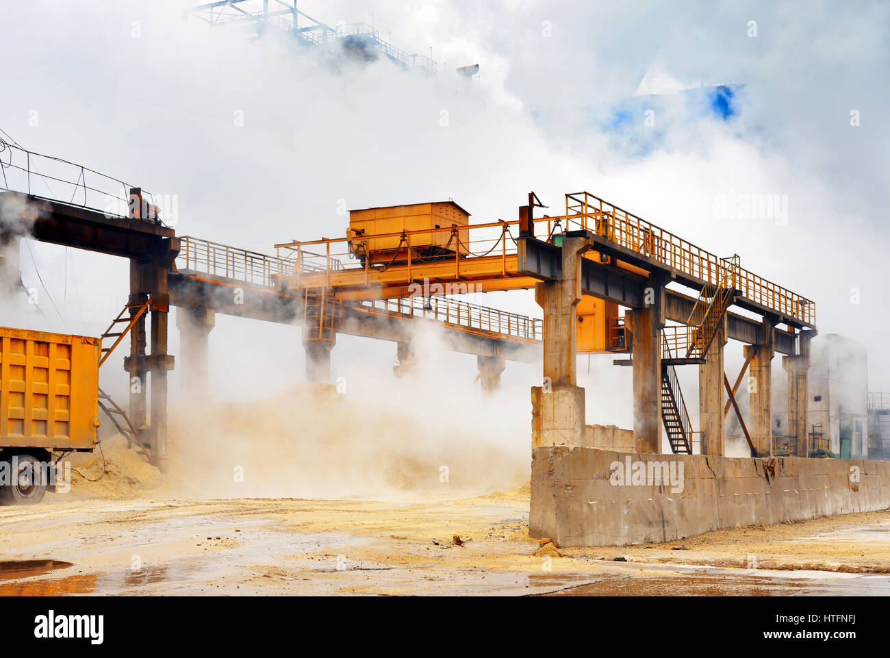 Steel mill crane, smoke-filled air pollution Stock Photo - Alamy