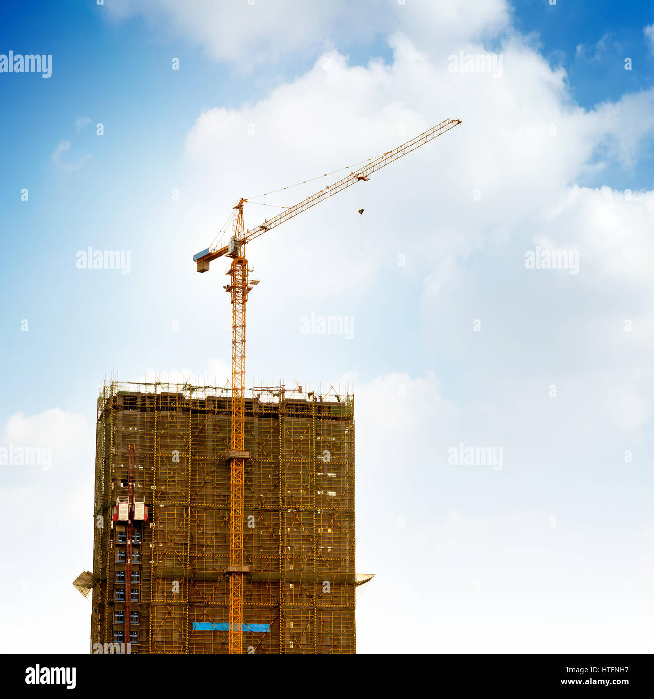 Big Construction Site with Working Cranes at dusk for Business Stock ...