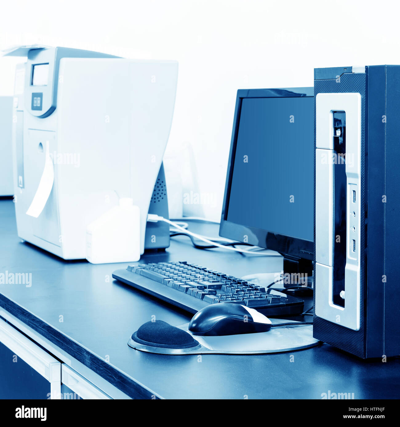 printer and computers in a modern office Stock Photo - Alamy