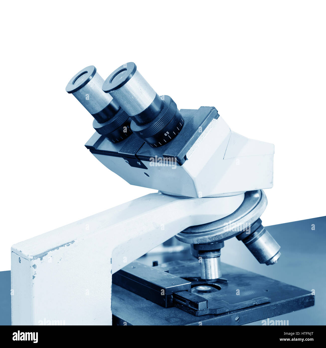 Microscope isolated against white background Stock Photo - Alamy