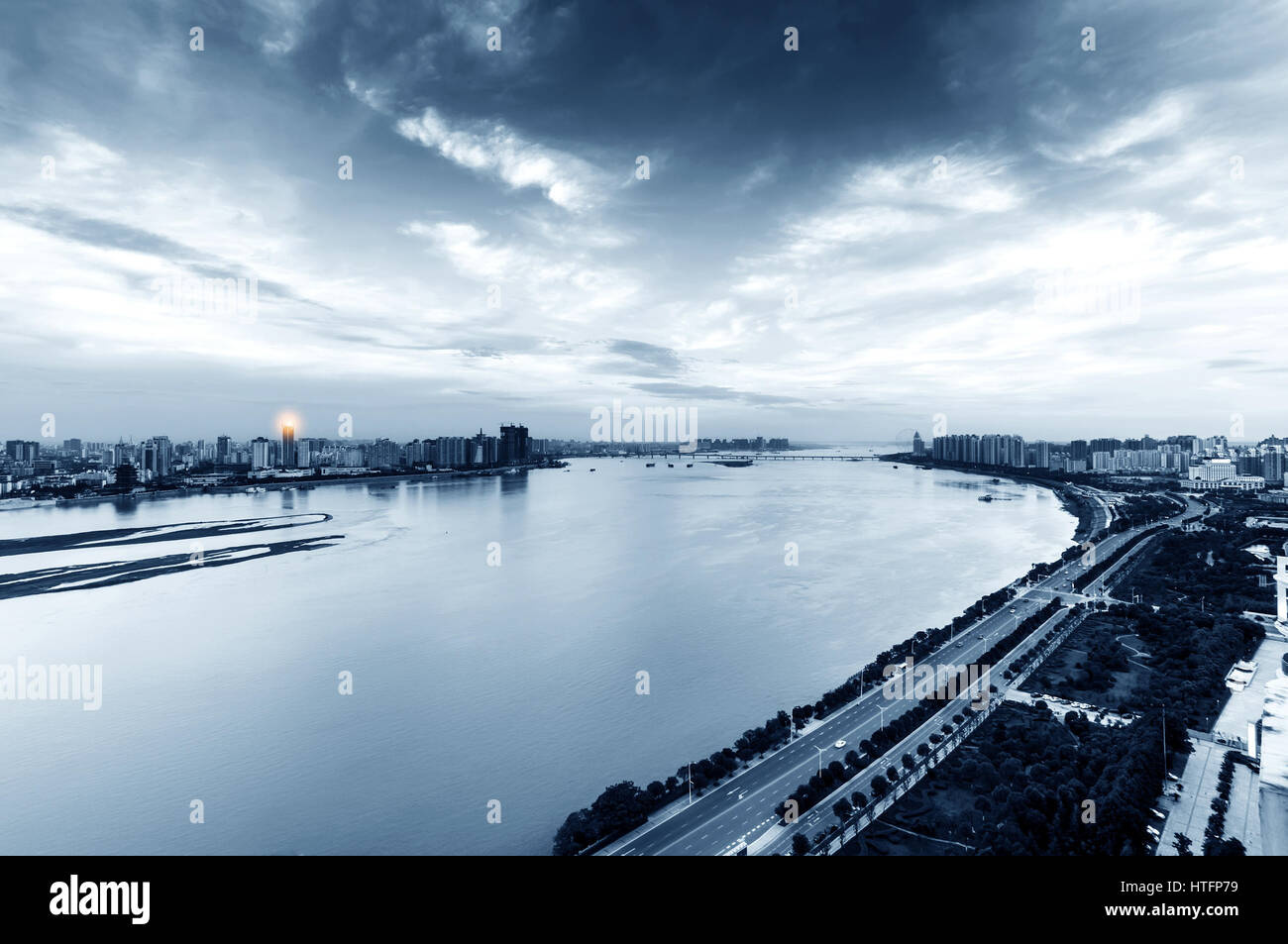 Aerial view of cities, rivers and fantastic evening clouds Stock Photo ...