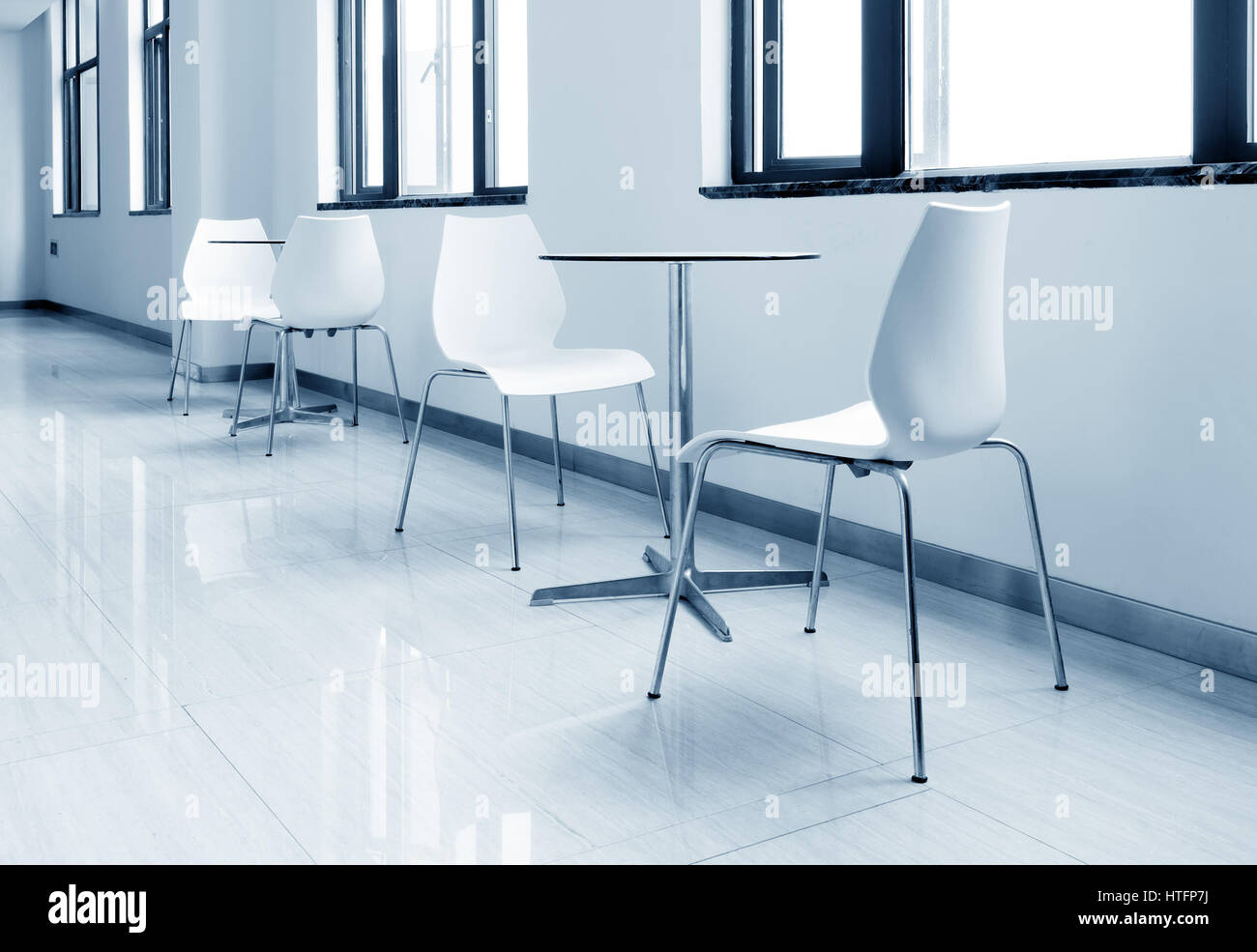 Round blue tables hi-res stock photography and images - Alamy