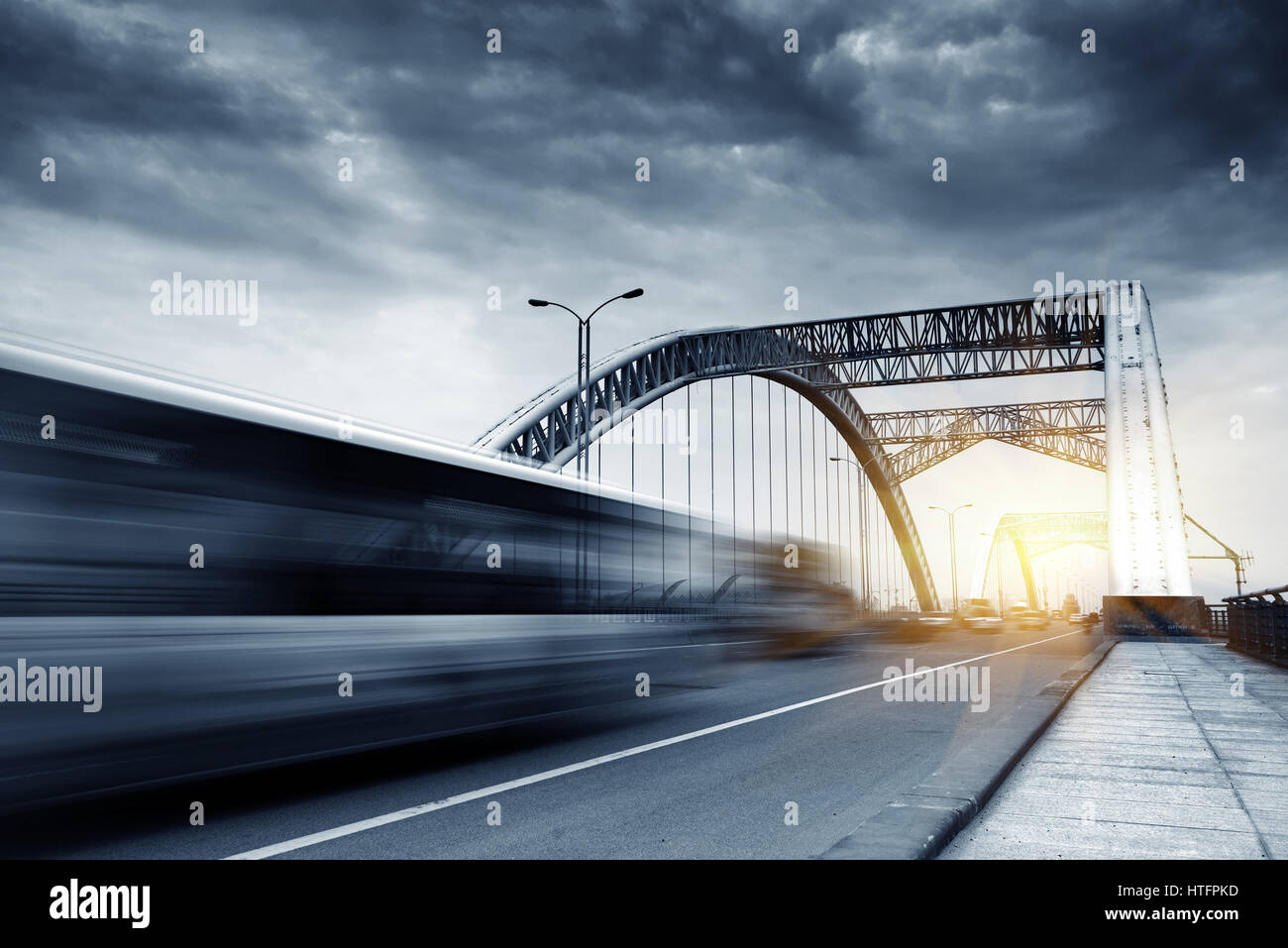 speeding truck go through the bridge Stock Photo - Alamy